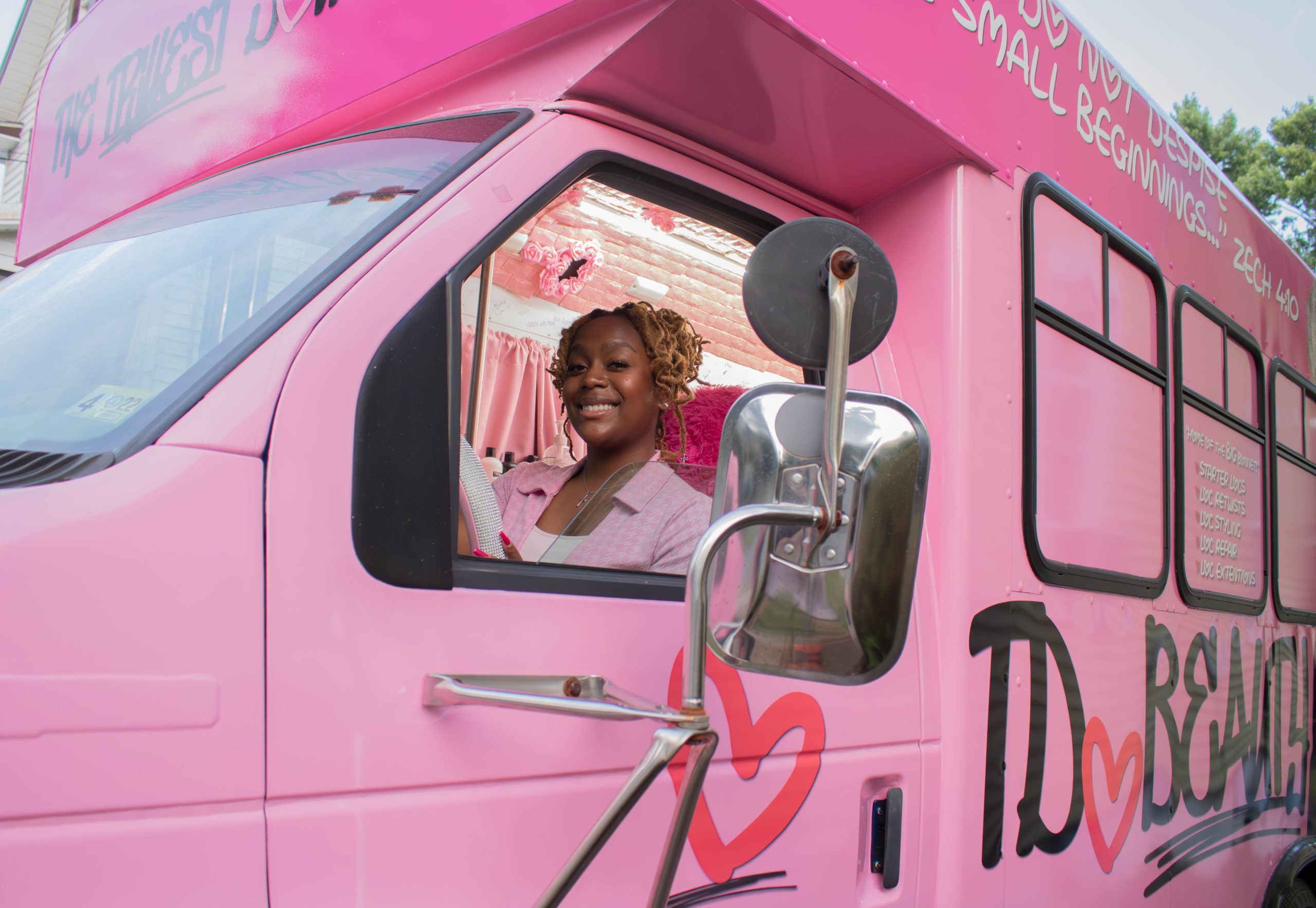 In bright pink bus, Baltimore mobile salon owner helps clients embrace ...