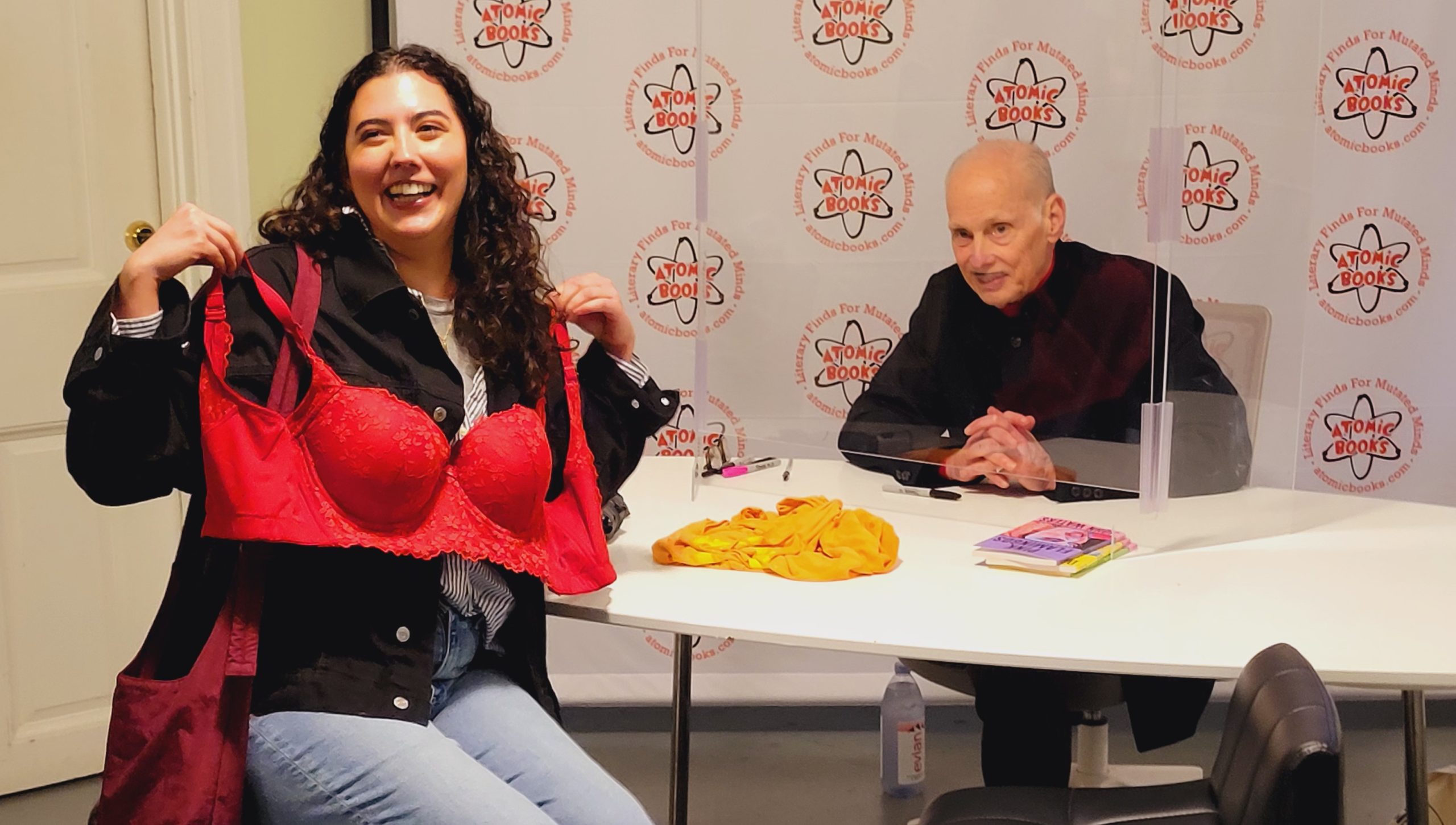 Despite rain, hundreds of John Waters fans gather for book-signing