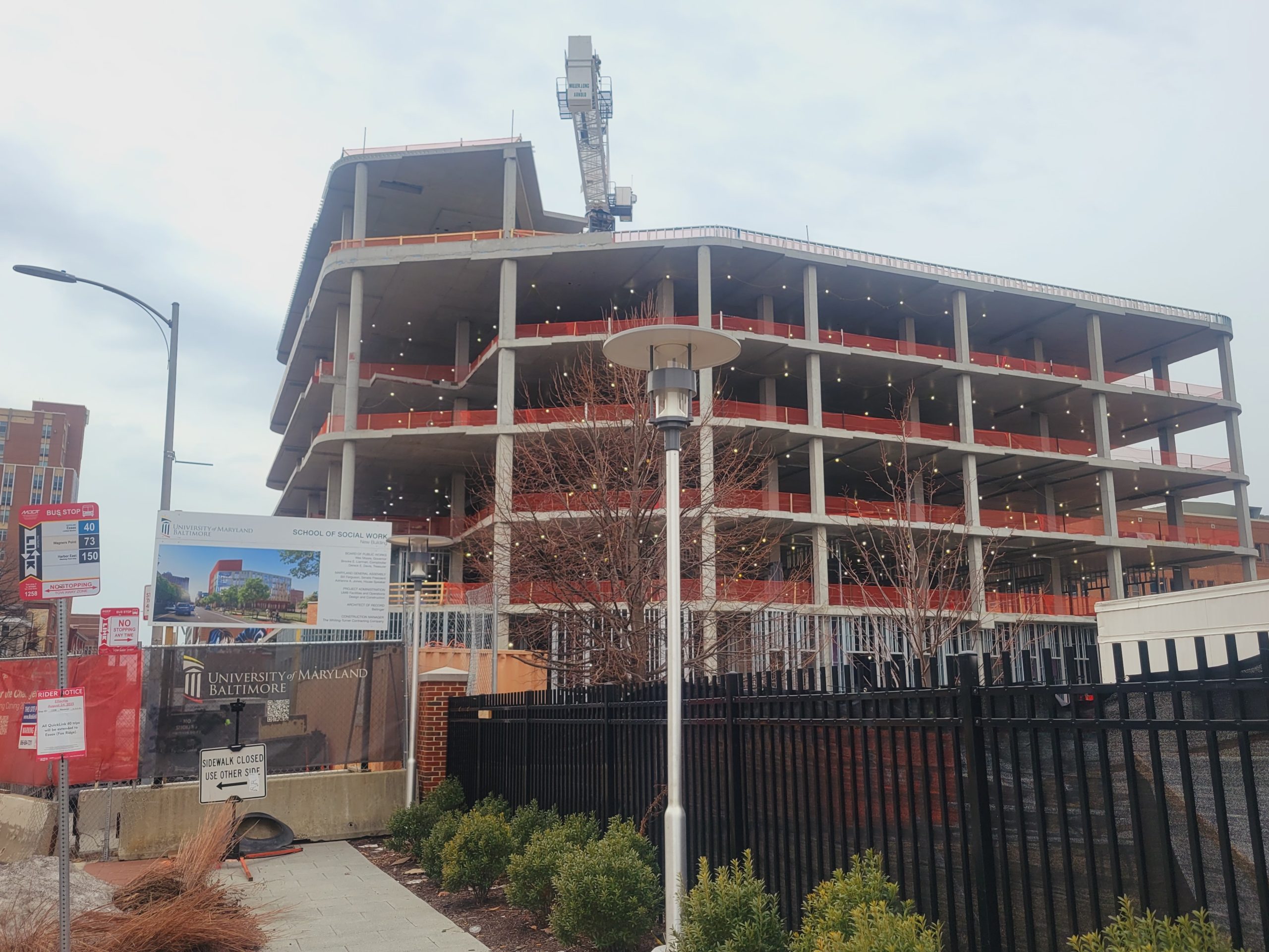 UMB holds topping-off ceremony for School of Social Work building